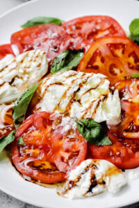Easy Burrata Caprese Salad Recipe - Savoring Italy