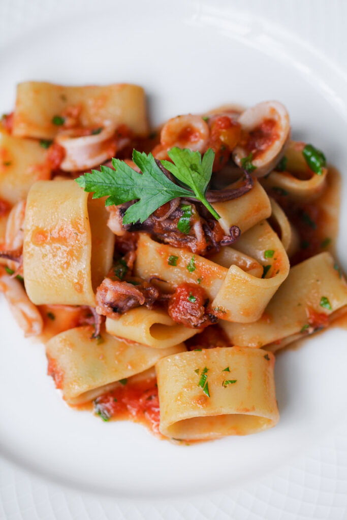 Pasta Calamarata (Pasta with Calamari and Tomato Sauce) - Savoring Italy